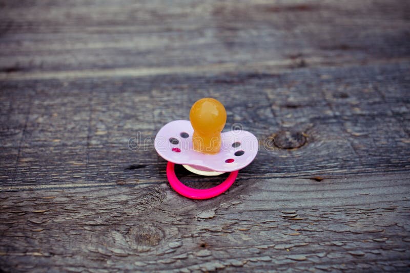 Baby Pacifier on Wooden Background Stock Image - Image of little, mouth ...