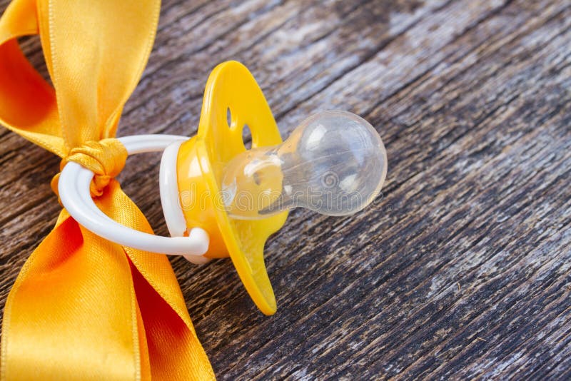 Yellow pacifier stock photo. Image of isolated, rubber - 17361976