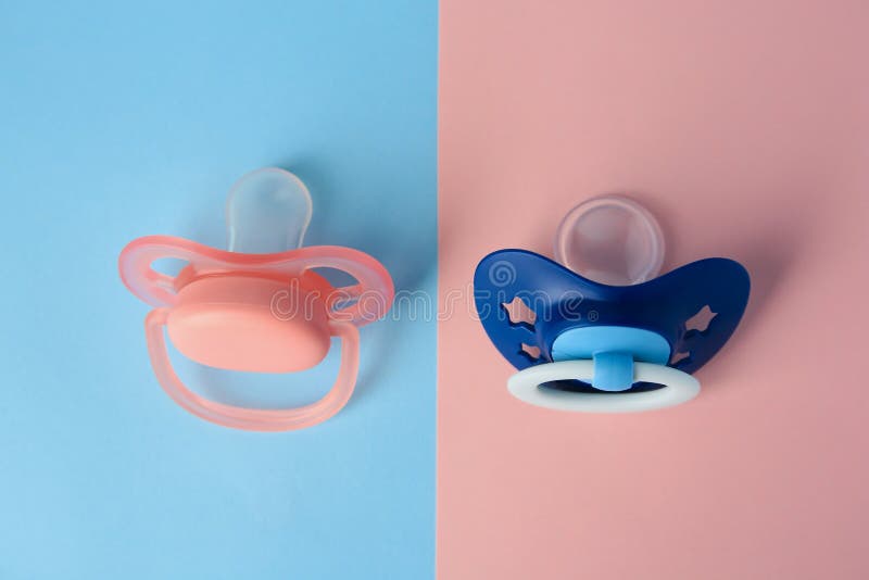 Baby Pacifiers on Color Background, Above View Stock Photo - Image of ...