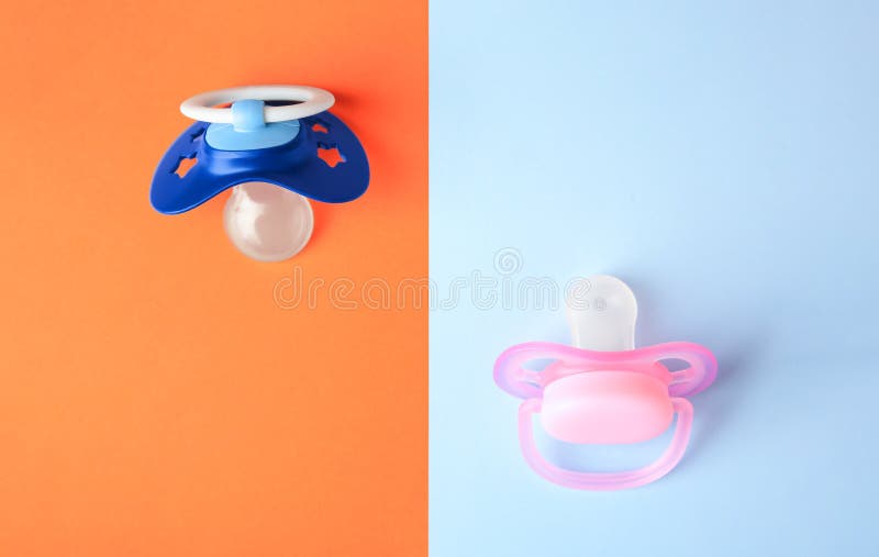 Baby Pacifiers on Color Background, Flat Lay Stock Photo - Image of ...