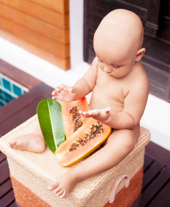 Baby with papaya stock image. Image of juicy, fresh, papaya - 28908267