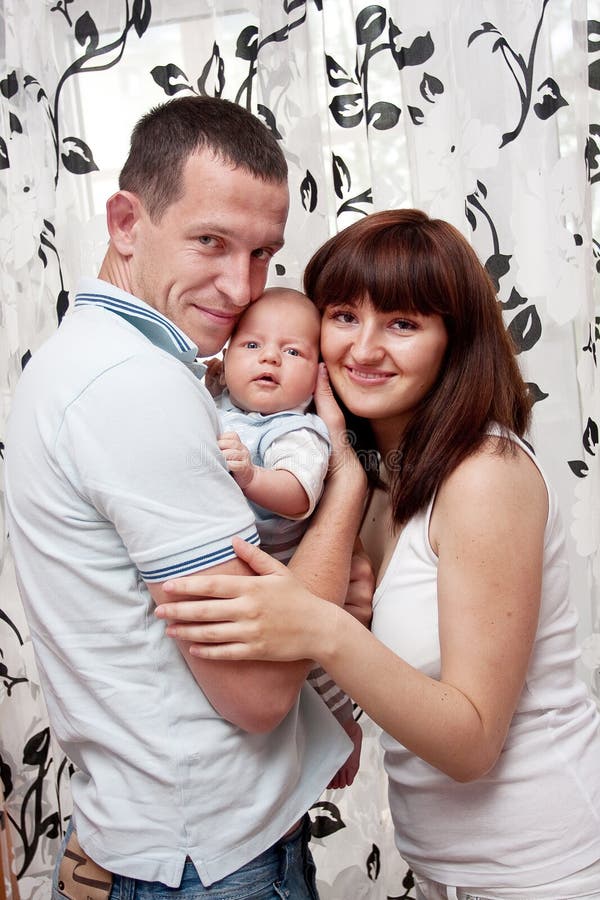 Baby with parents stock photo. Image of human, holding - 18078798