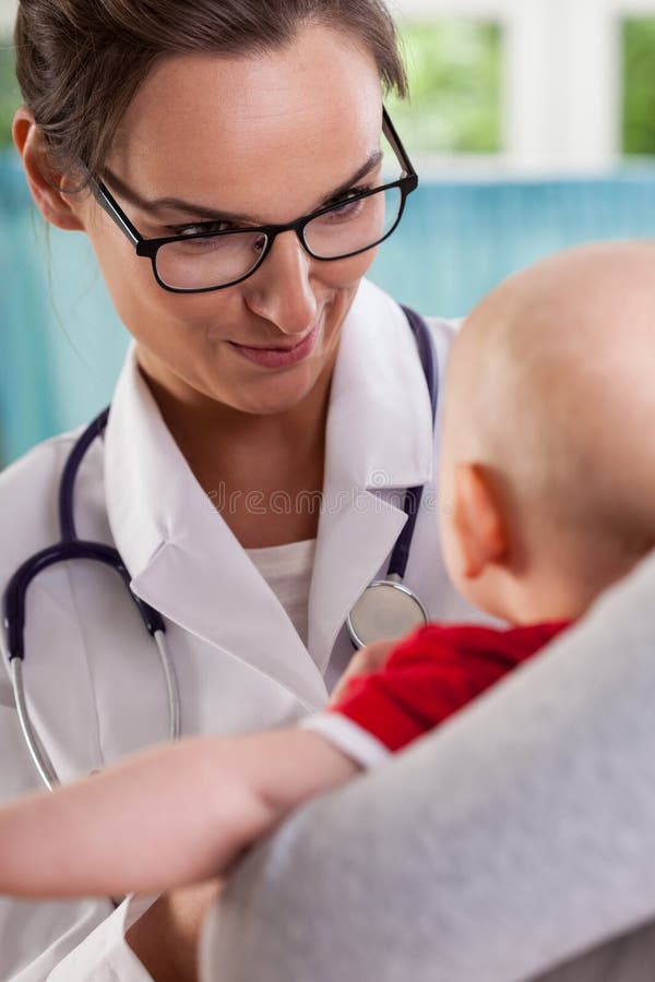 Baby at pediatrician stock image. Image of coat, friendly - 45067707