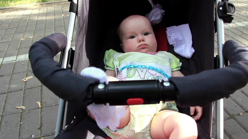 Baby in perambulator stock video footage. Video of kindergarten - 36600347