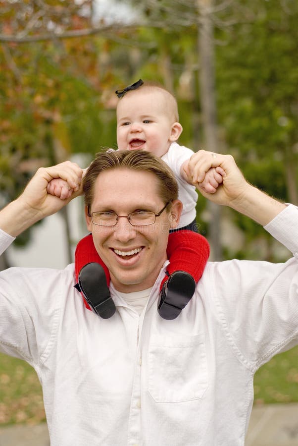 Baby piggyback stock image. Image of family, excited, laughing - 3774635