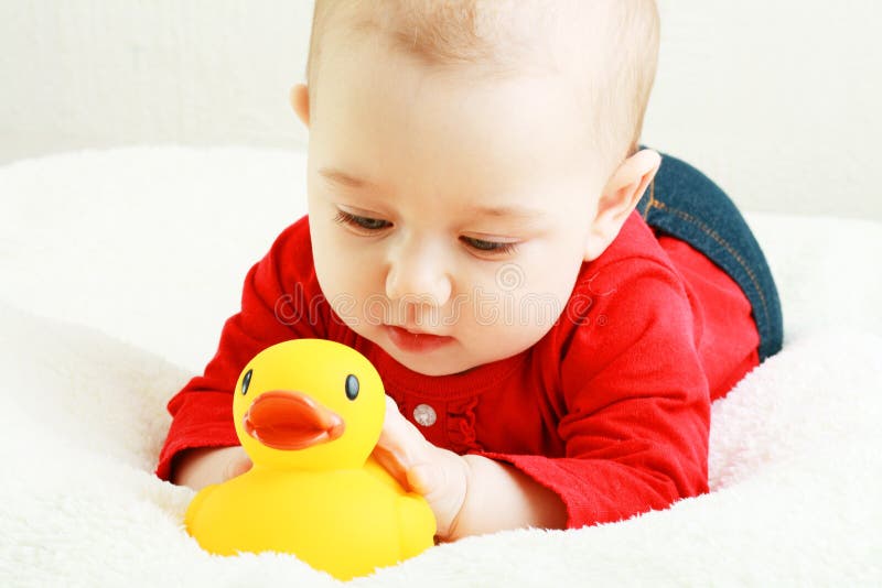 Baby play with toy stock photo. Image of offspring, infancy - 30781104