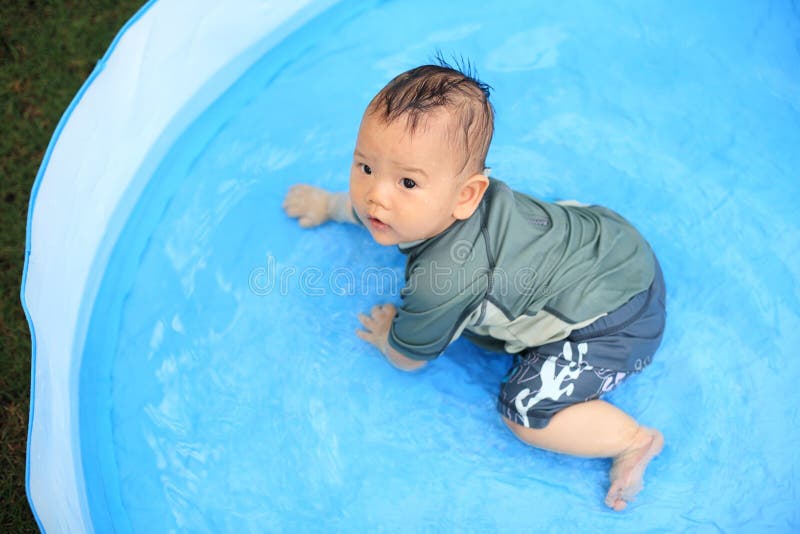 Baby Play Water in Kid Inflatable Pool Stock Image - Image of little ...