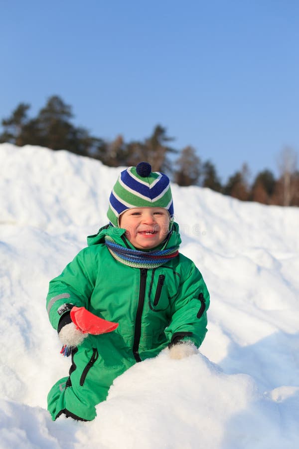 Baby play winter stock image. Image of leisure, hill - 24251825