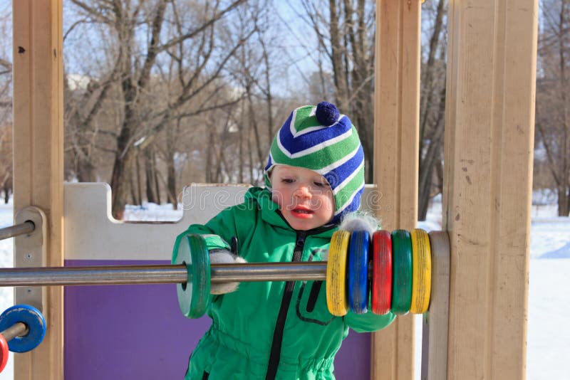 Baby in playground stock photo. Image of casual, active - 23781294