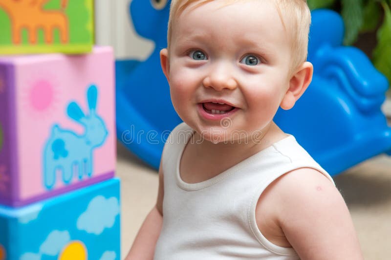 Baby playing with blocks stock photo. Image of caucasian - 87470206