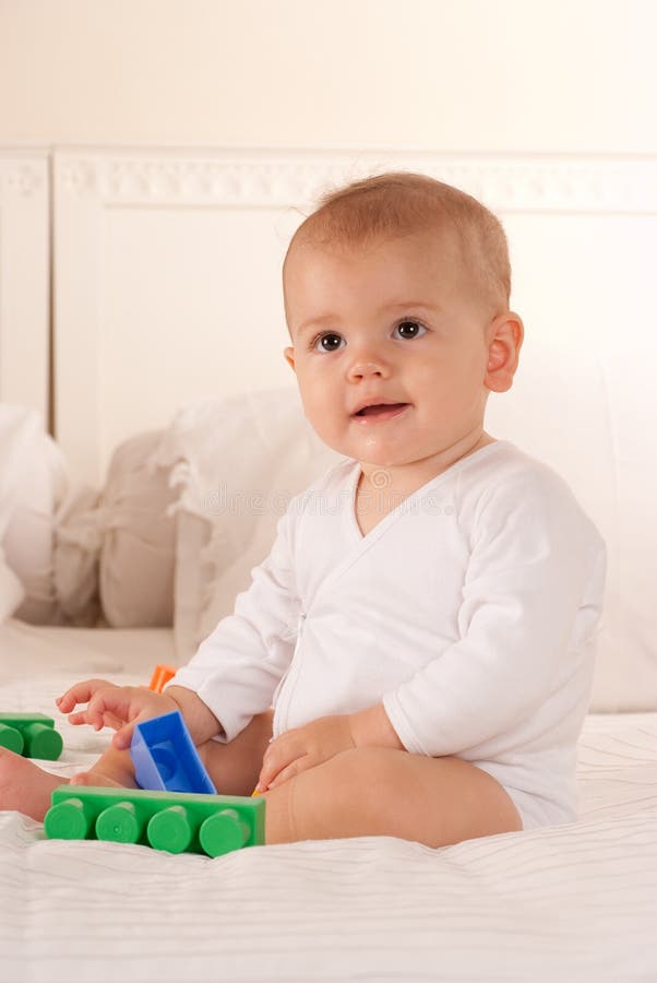 Baby and playing bricks stock image. Image of baby, healthy - 19152599