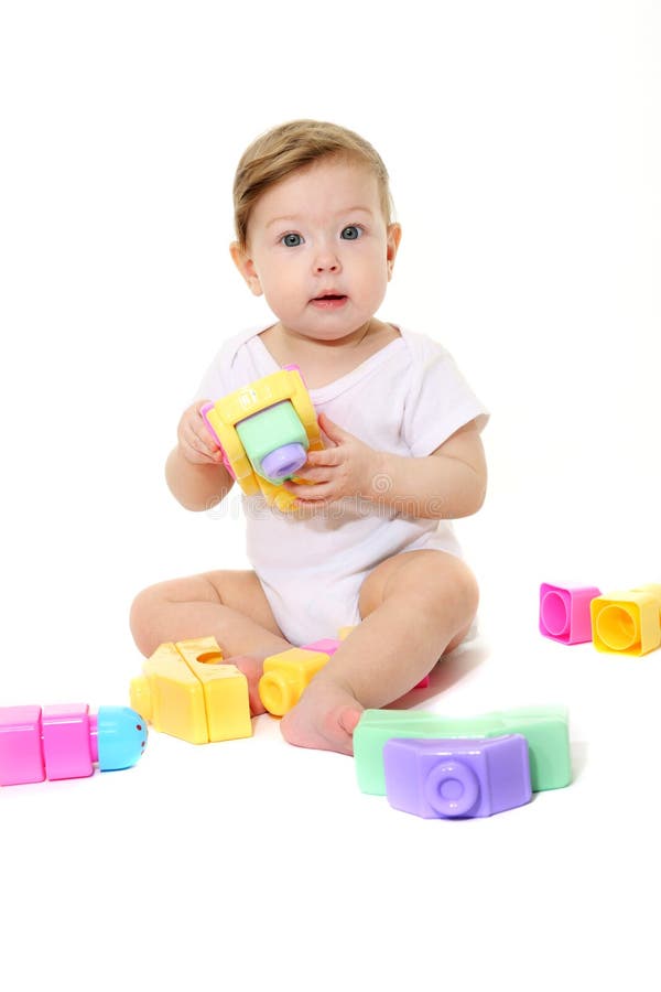 Baby Playing with Colored Blocks Stock Image - Image of hand, happy ...