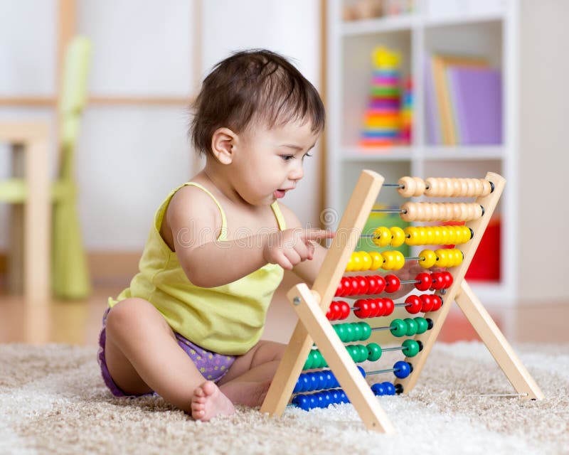 Baby Playing with Counter Toy Stock Image - Image of person, math: 66017785