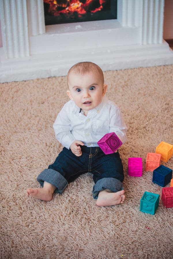 Baby playing with cubes stock image. Image of build, leisure - 54946875