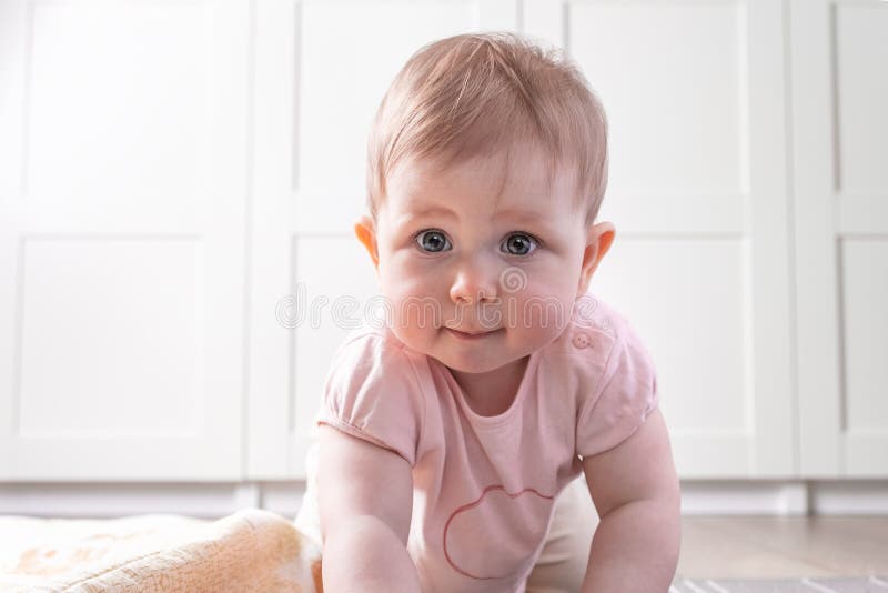 Baby playing on floor stock image. Image of floor, care - 143881751