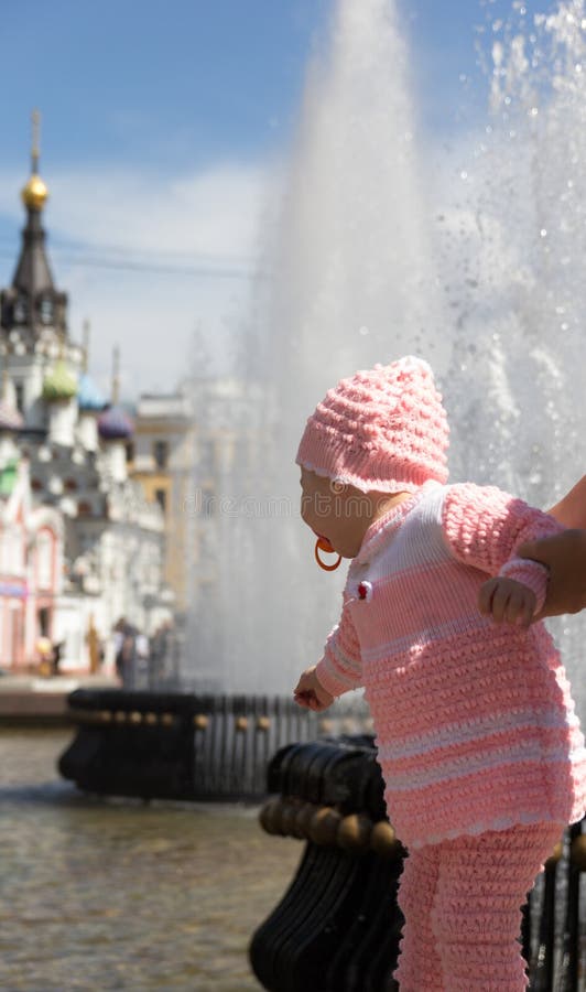 The Baby is Playing at the Fountain Stock Photo - Image of family, drop ...