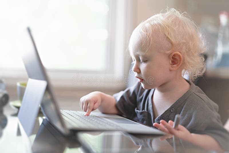 Baby Playing with Laptop Computer . Stock Photo - Image of marketing ...