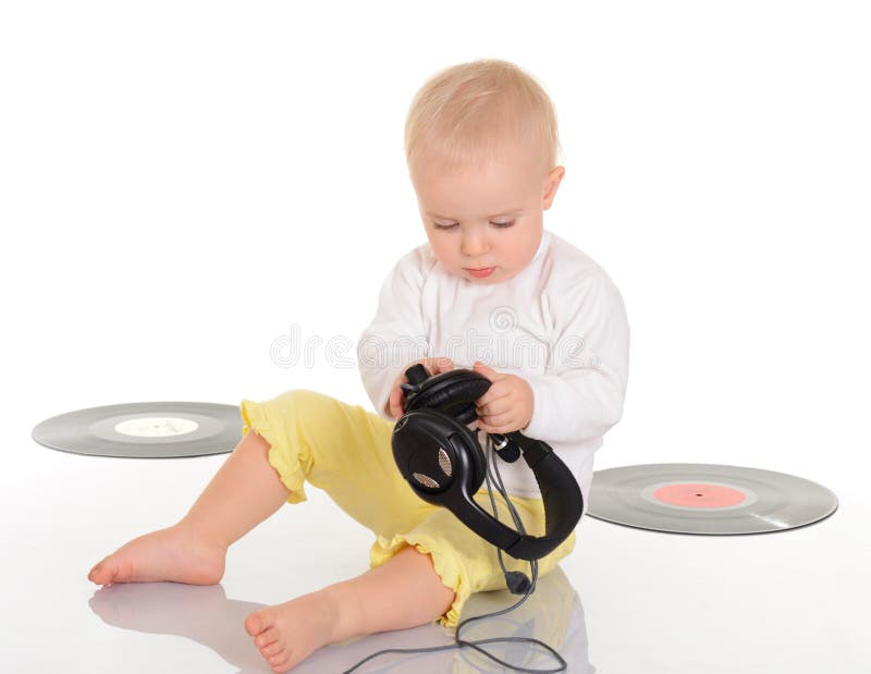 Baby Playing with Old Vinyl Record and Headphones Stock Image - Image ...