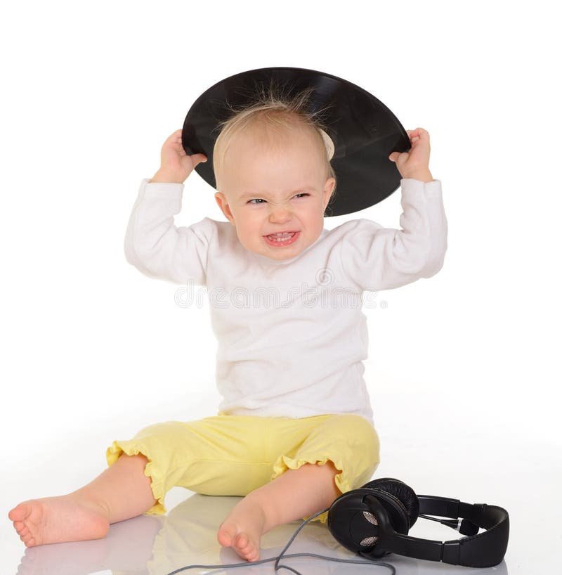 Baby Playing with Old Vinyl Record and Headphones Stock Image - Image ...