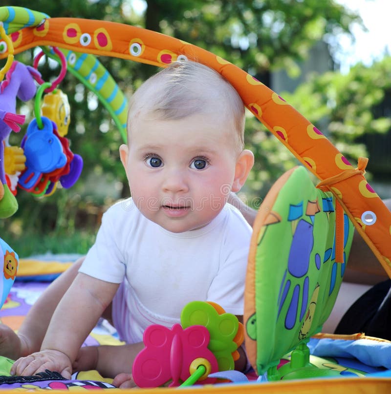Baby playing outdoors stock photo. Image of garden, girl - 12909844