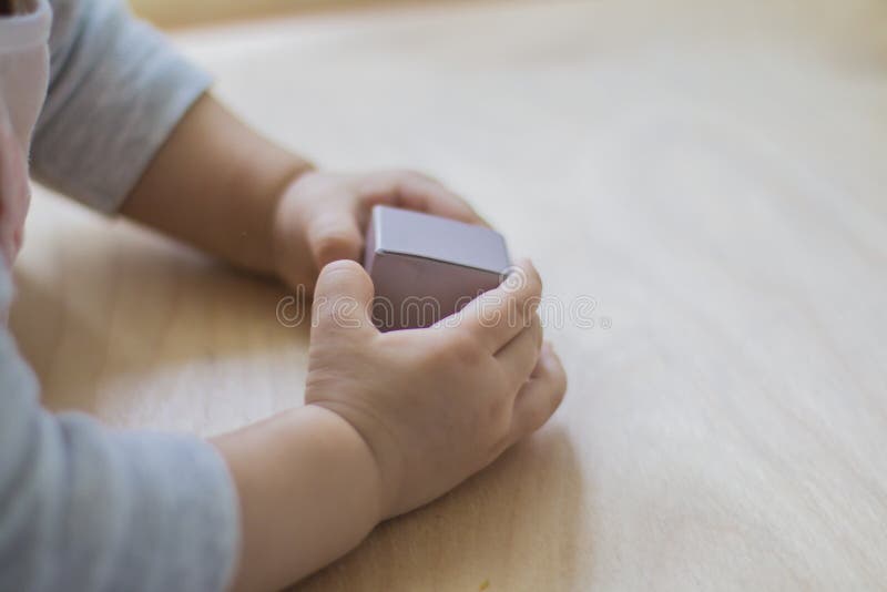 Baby Playing with Paper Cube Stock Image - Image of childhood, human ...
