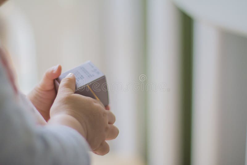 Baby Playing with Paper Cube Stock Image - Image of beverage, human ...