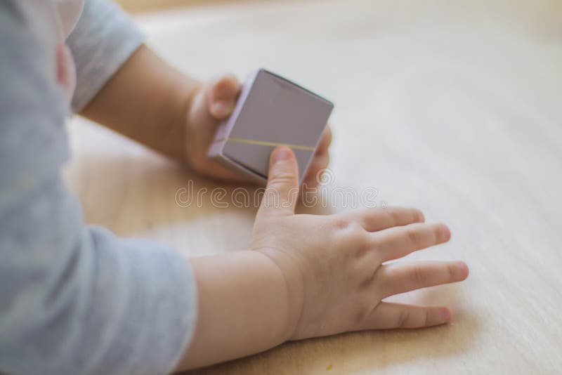 Baby Playing with Paper Cube Stock Photo - Image of playing, newborn ...