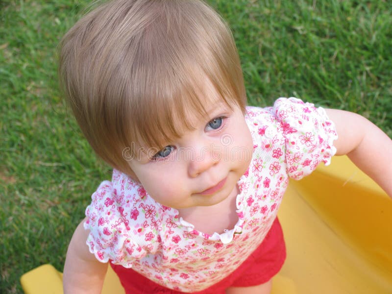 Baby playing on slide stock image. Image of outdoors, young - 787895