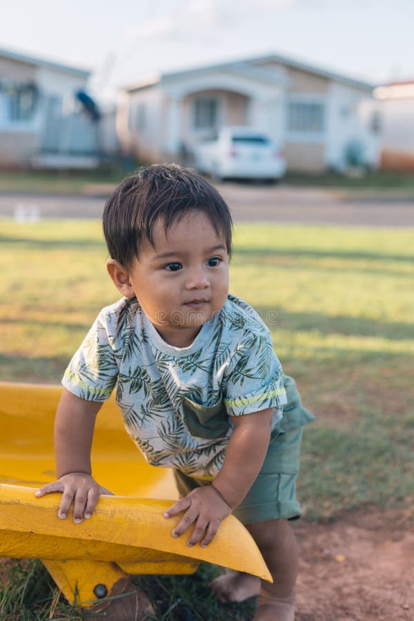 Baby Playing on the Slide of the Park Stock Image - Image of ride ...