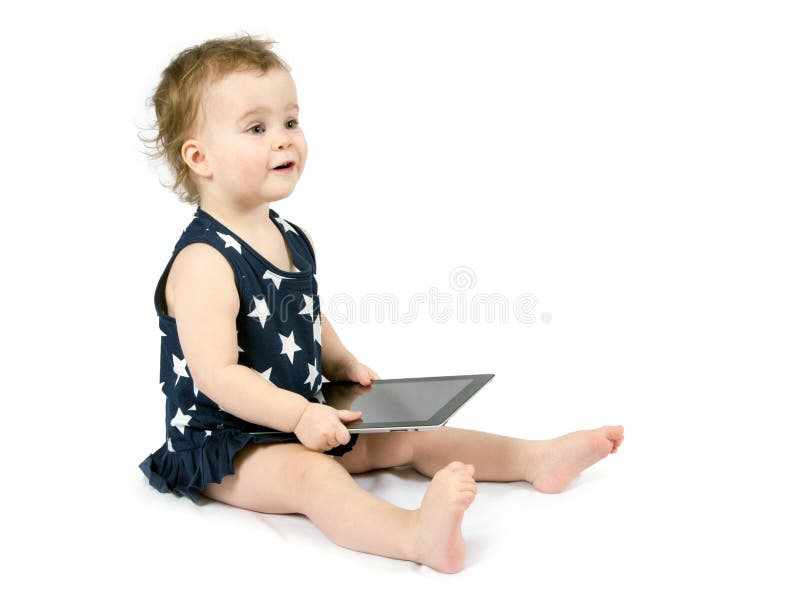 Baby playing with tablet stock photo. Image of playful - 24416224