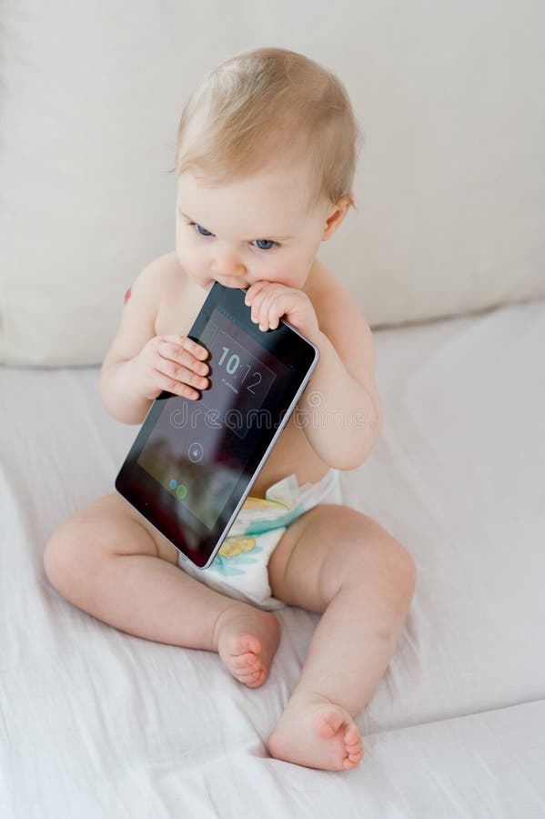 Baby playing with tablet stock photo. Image of nice, baby - 37196908