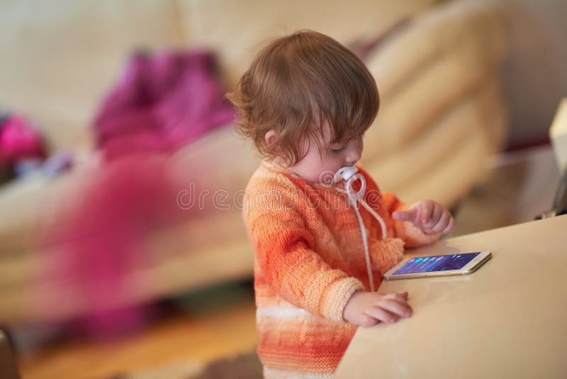 Baby Playing with Tablet at Home Stock Photo - Image of childhood ...