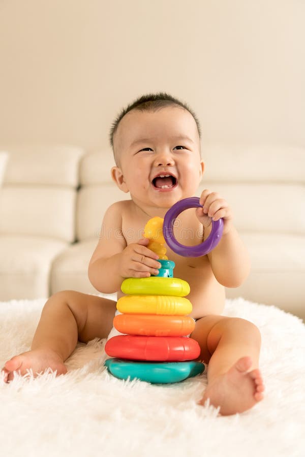 Baby playing toys stock photo. Image of development, circle - 97928614