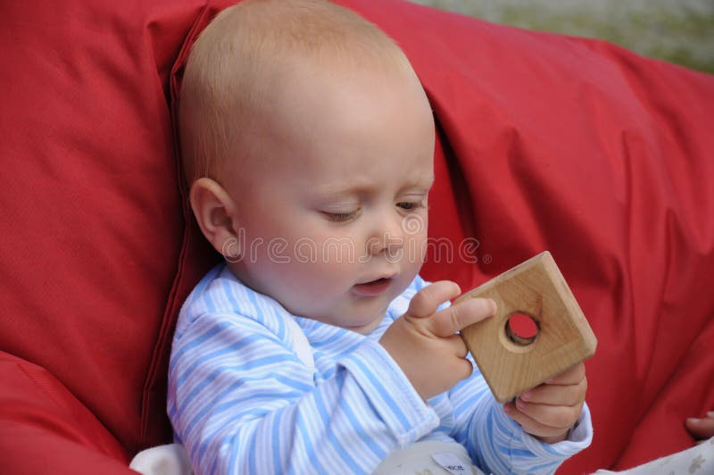 Baby Playing with Wooden Cube Stock Image - Image of baby, caucasian ...