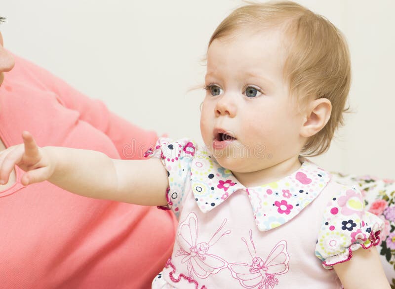 Baby is pointing a finger. stock image. Image of baby - 40088083