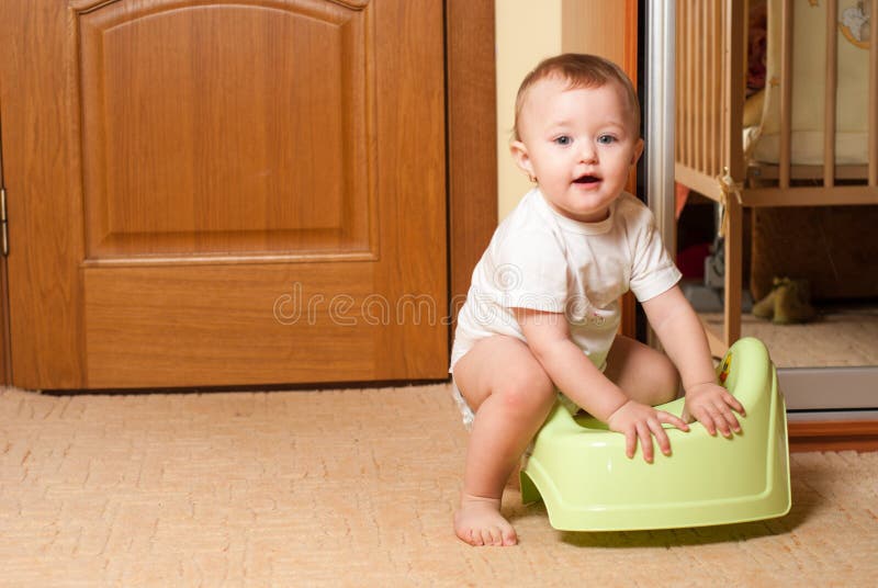 Baby on the pot stock image. Image of beautiful, closet - 26624989