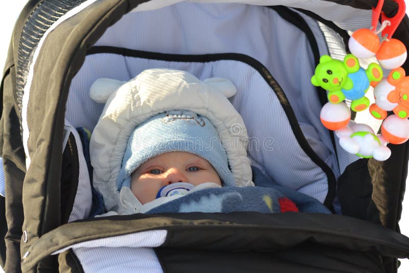 Baby in a pram stock image. Image of baby, child, white - 37104011