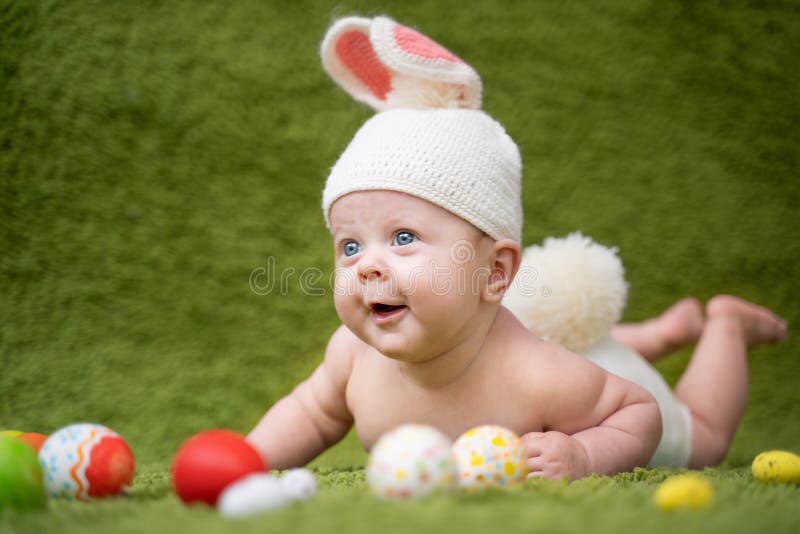 Baby in rabbit costume stock image. Image of rabbit - 176933809