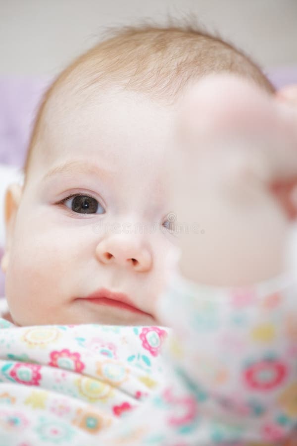 Baby raising his head stock photo. Image of happiness - 26541312