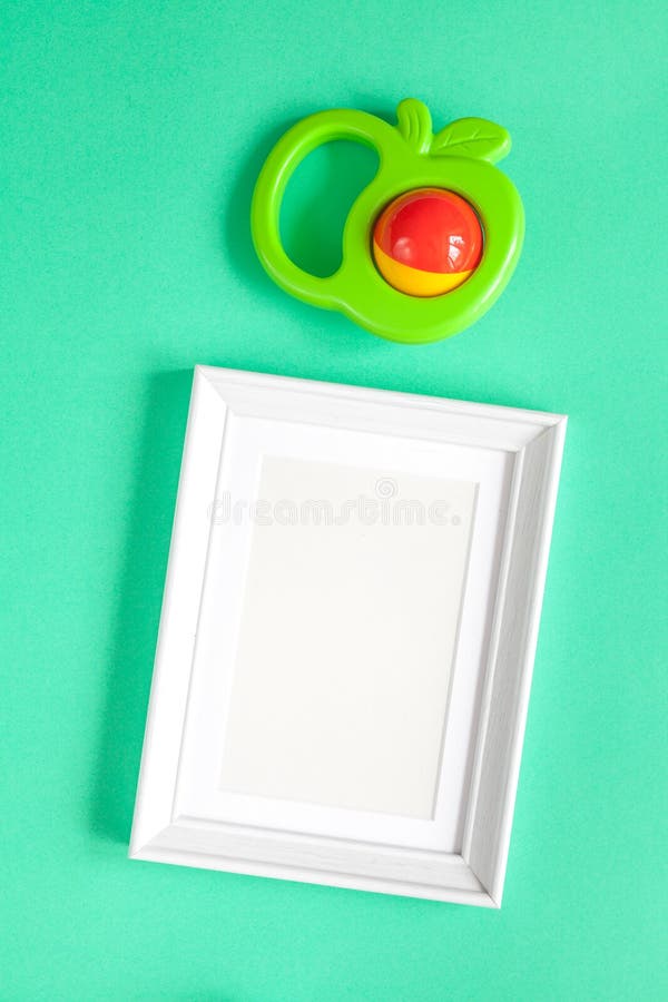 Baby Rattle Photo Frame Green Background Photos - Free & Royalty-Free ...