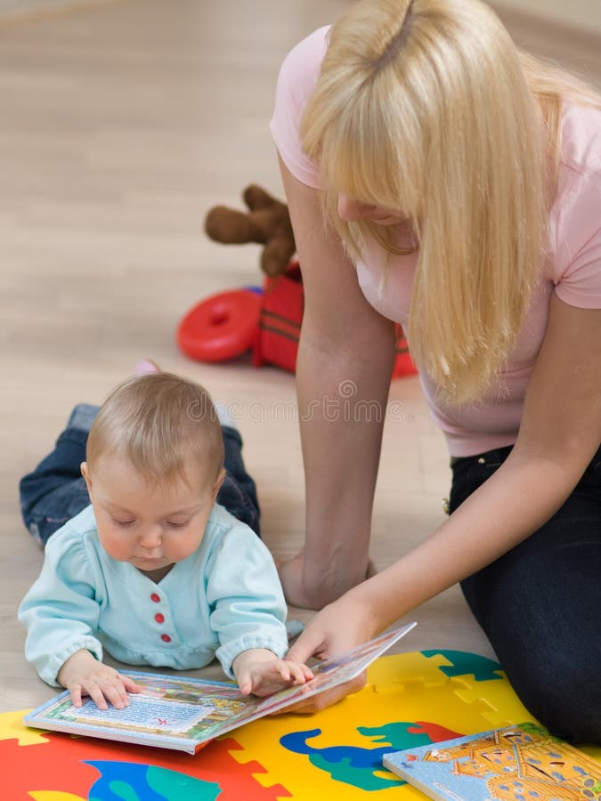 Baby reading stock image. Image of caucasian, listen, blonde - 8345979