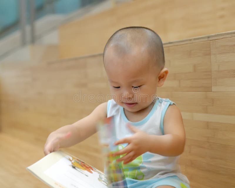 Baby reading book stock photo. Image of book, asian, child - 14428734