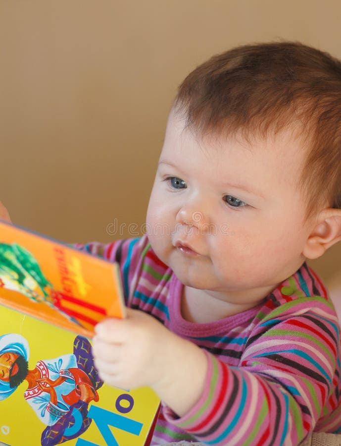 Baby , reading the book stock photo. Image of childhood - 9856644