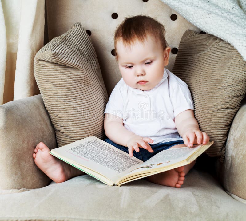 Baby reading a book stock photo. Image of leisure, education - 70733520