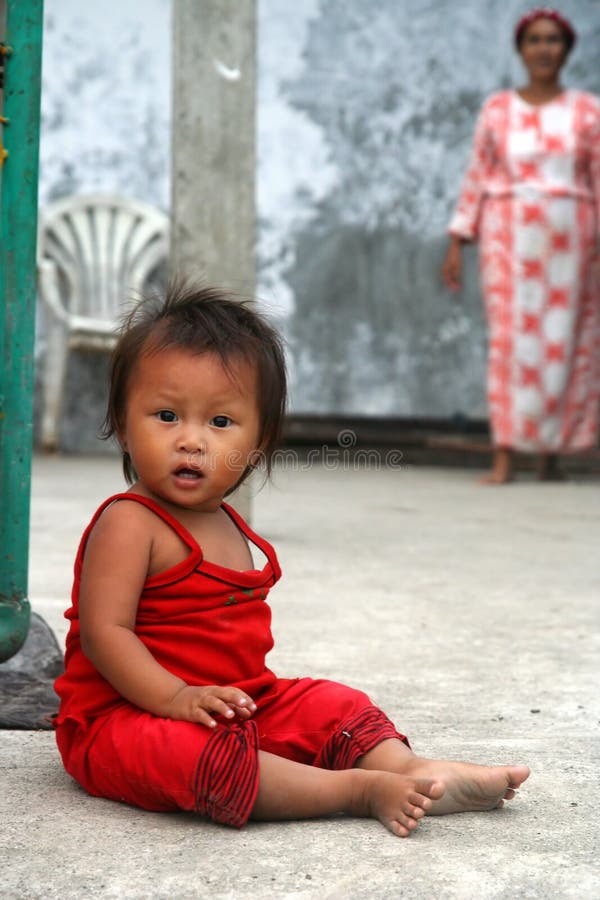 Baby in red editorial image. Image of asian, asia, human - 24133525
