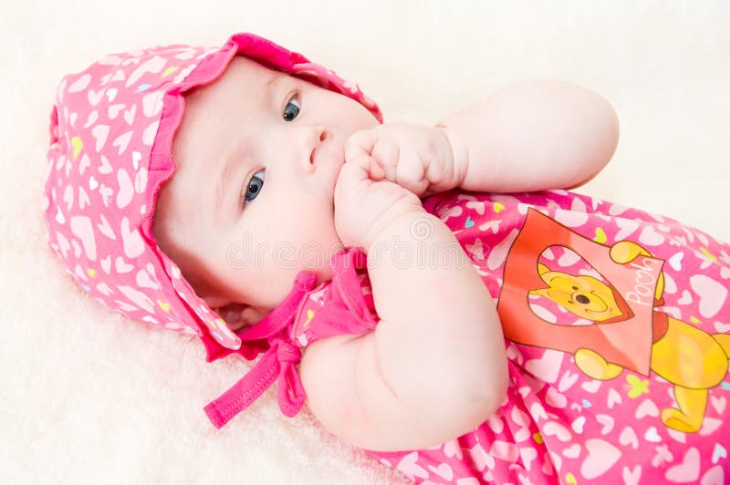 Baby in red clothes stock image. Image of hands, human - 24438437