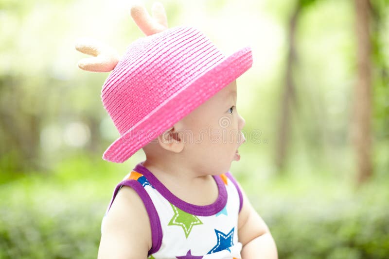 Baby in red hat stock image. Image of portrait, looking - 43361969