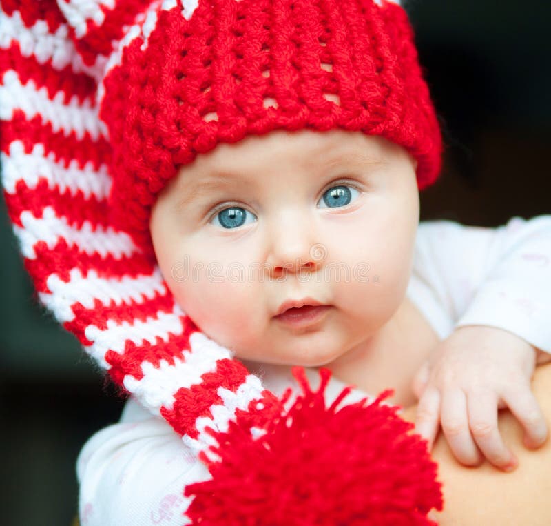 Baby in a winter hat stock photo. Image of green, knitted - 44745960