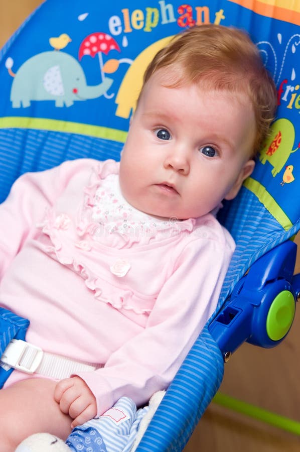 Baby on rocker stock image. Image of baby, beautiful - 15530983