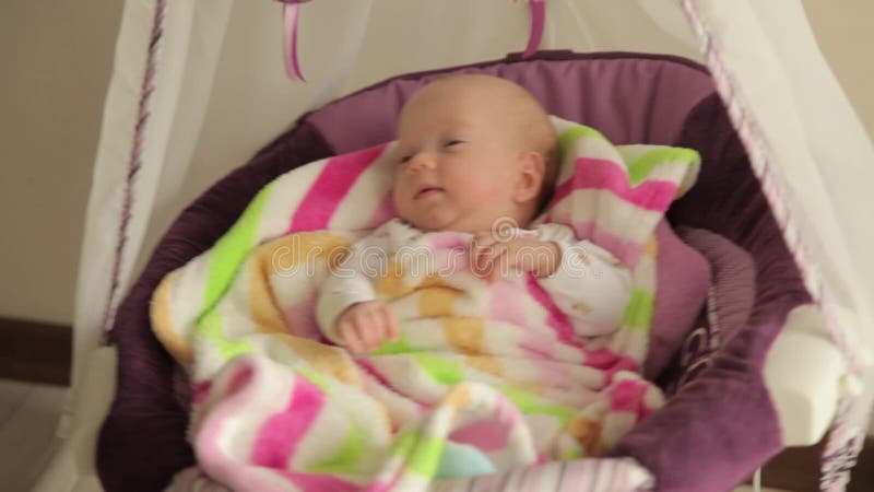 Baby rocking in a cradle stock footage. Video of bonding - 80603584